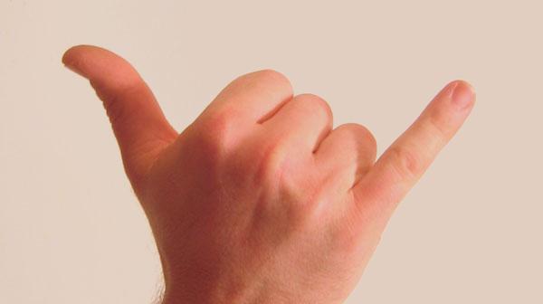 Gesture raised fist with thumb and pinky lifted jpg gesture-raised-fist-with-thumb-and-pinky-lifted-jpg